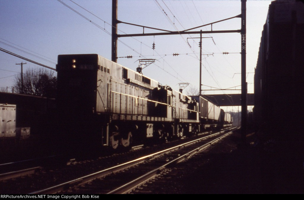 Westbound PC E44 at sunrise under the Angle Street bridge